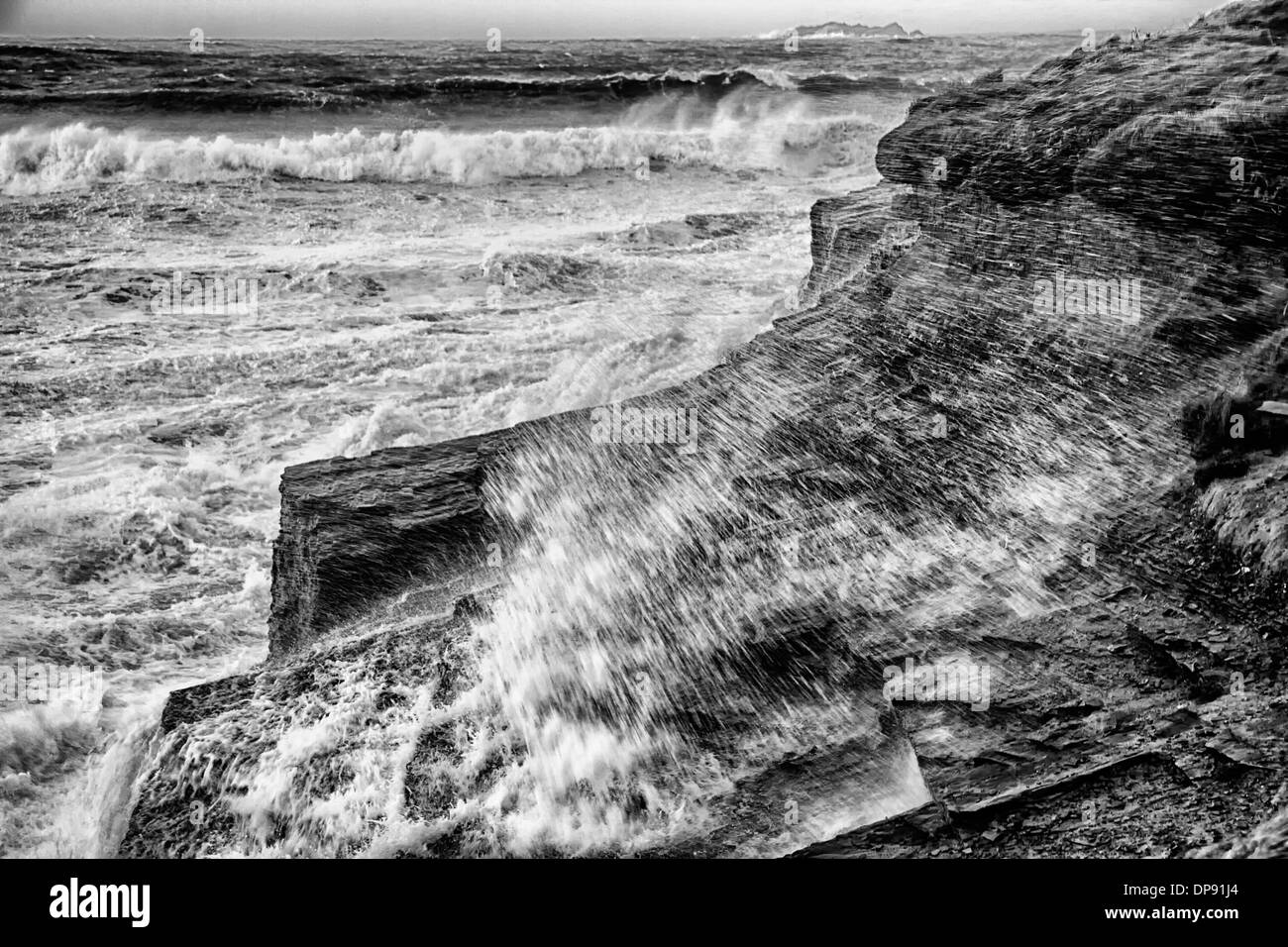 Waves crashing on cliffs during a storm, Harlyn Bay, Padstow, Cornwall ...