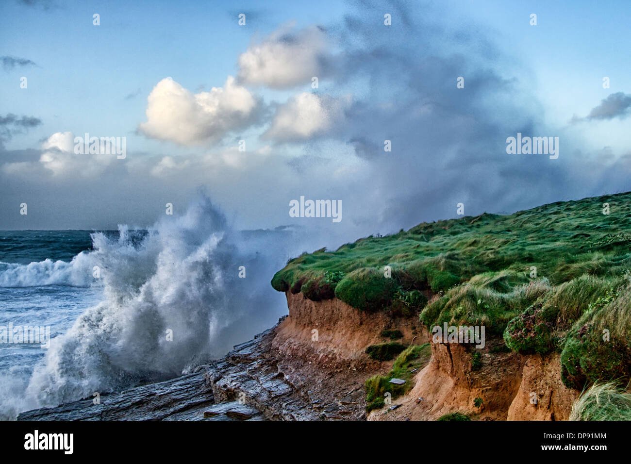 Waves crashing on cliffs during a storm, Harlyn Bay, Padstow, Cornwall ...