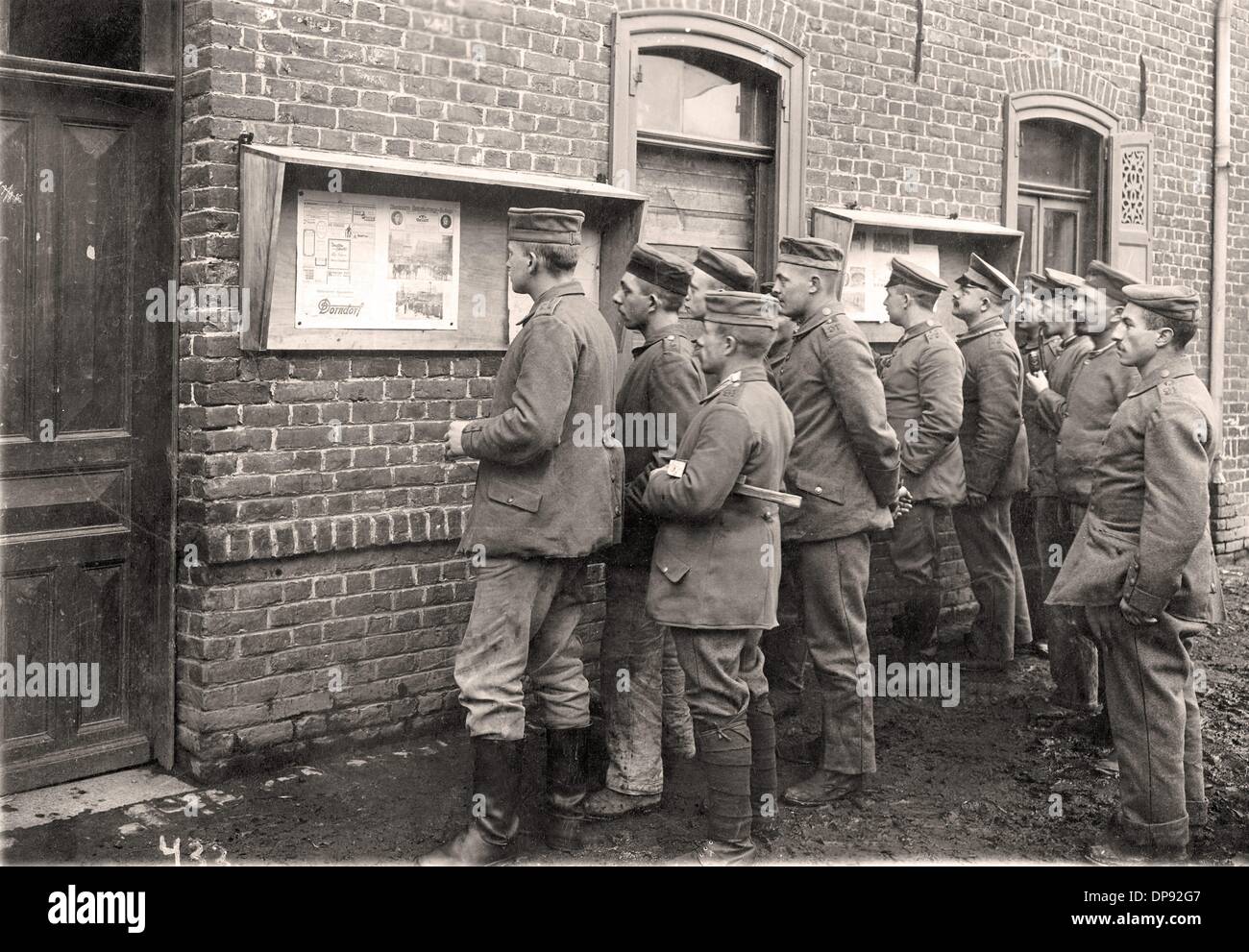 German soldiers read an illustrated newspaper at the Western Front in ...