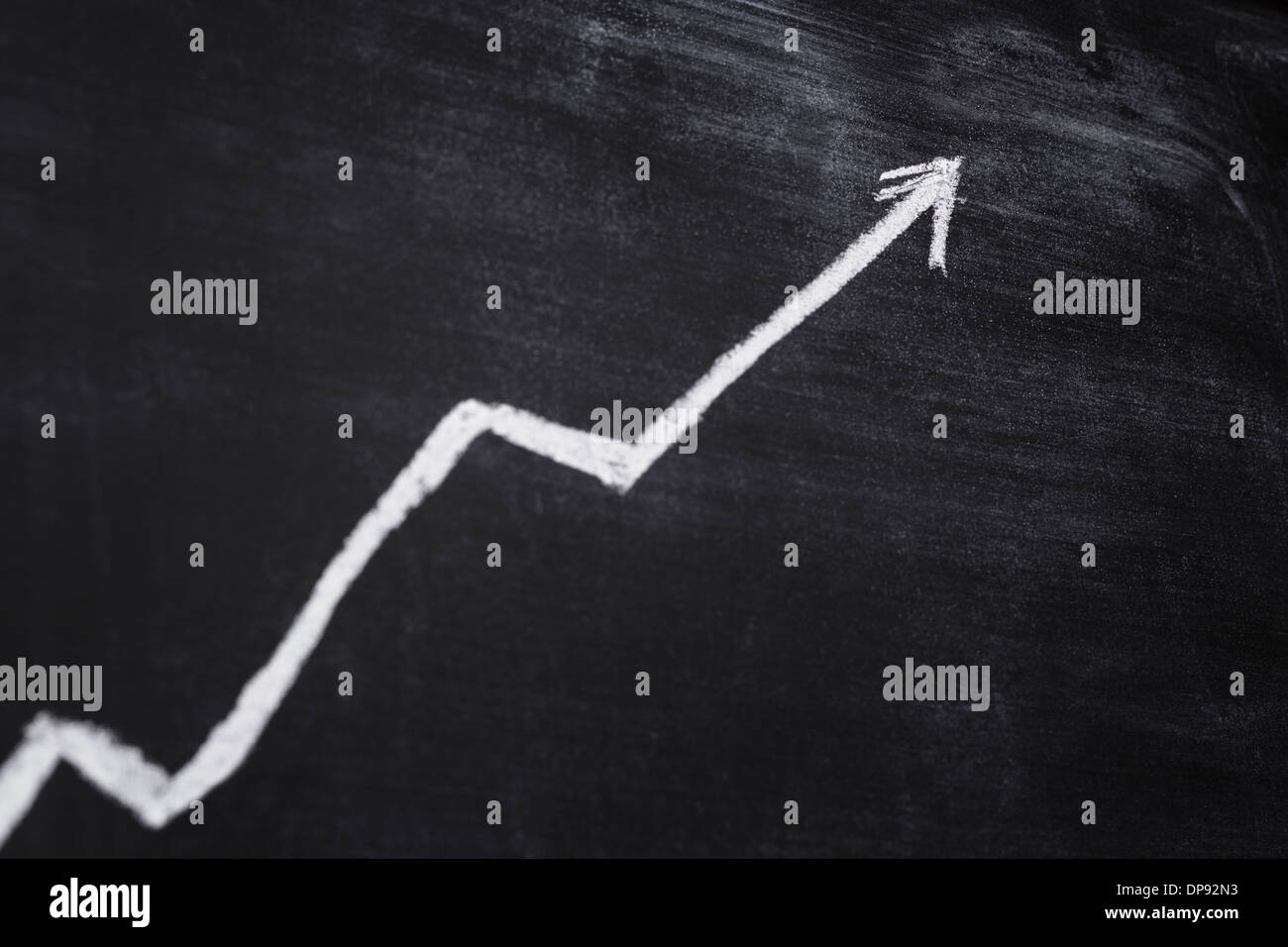 positive graph on blackboard, finance or something else Stock Photo - Alamy