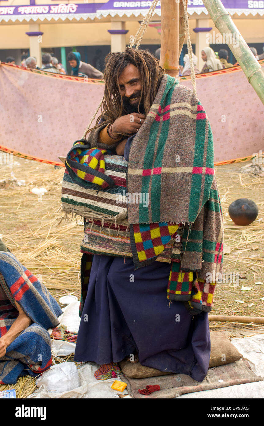 Sadhu (holy man) with dreadlocks carrying out a standing penance at the ...