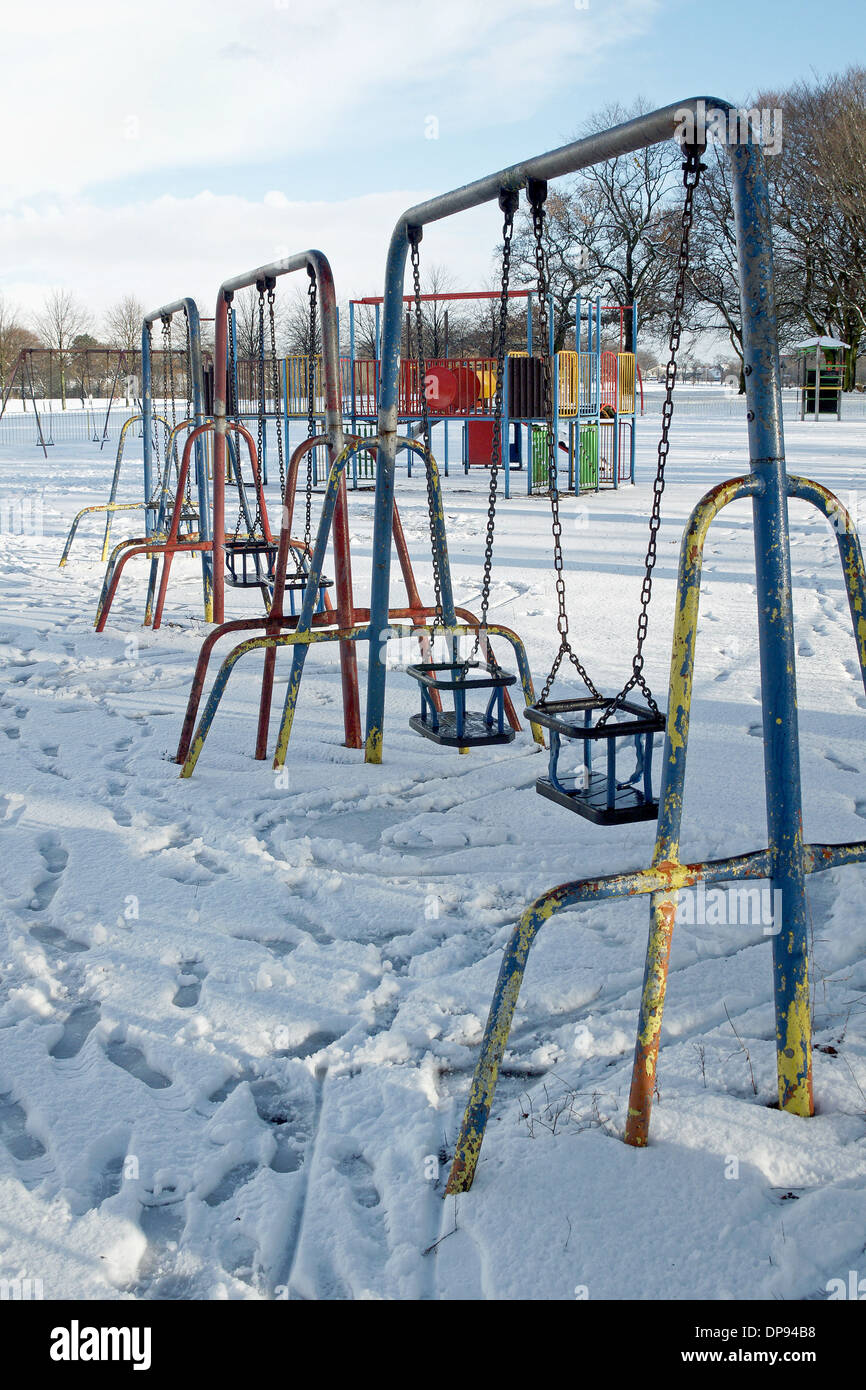 Children's play area in snow, Moor Park, Preston, Lancashire Stock ...