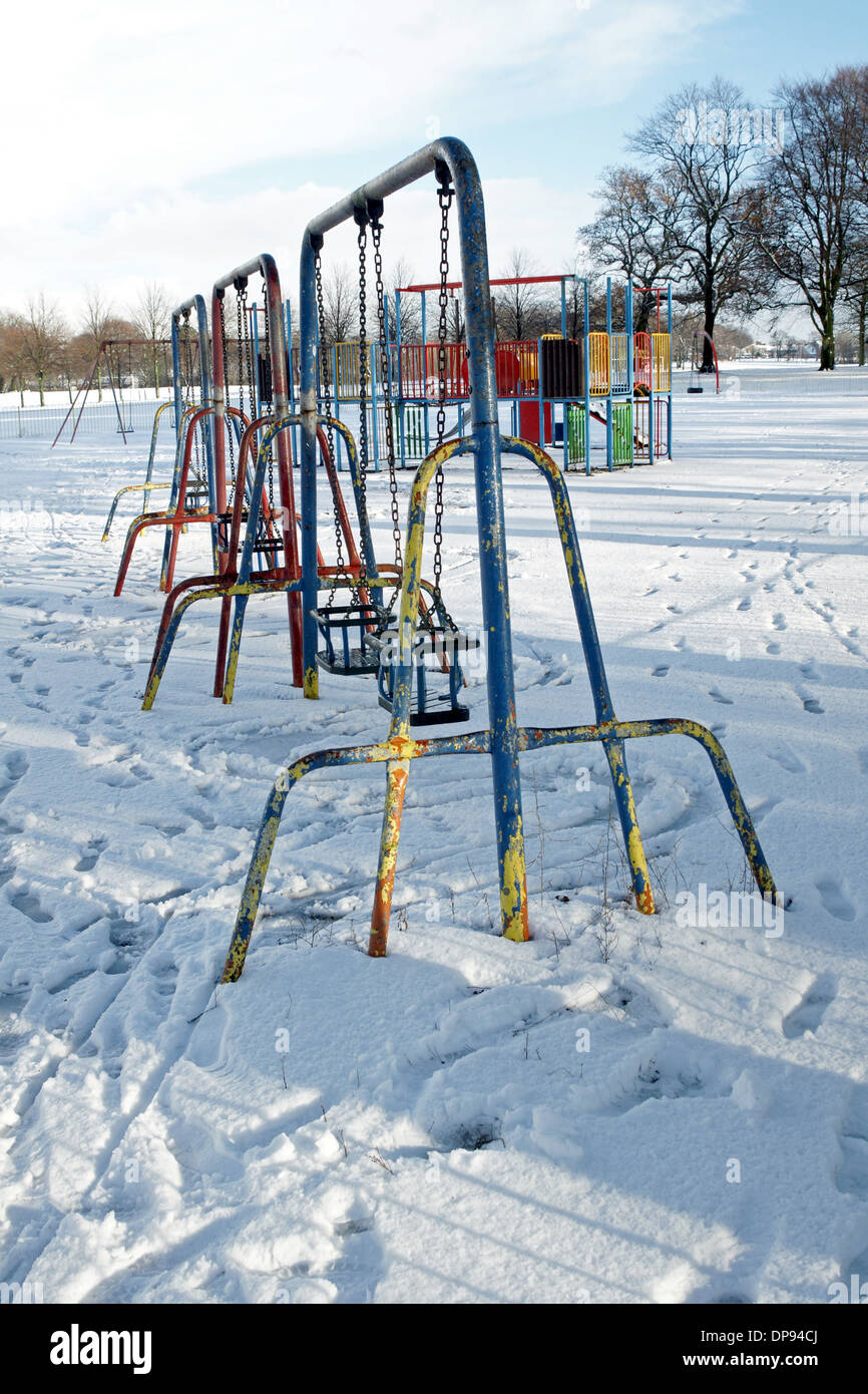 Children's play area in snow, Moor Park, Preston, Lancashire Stock ...