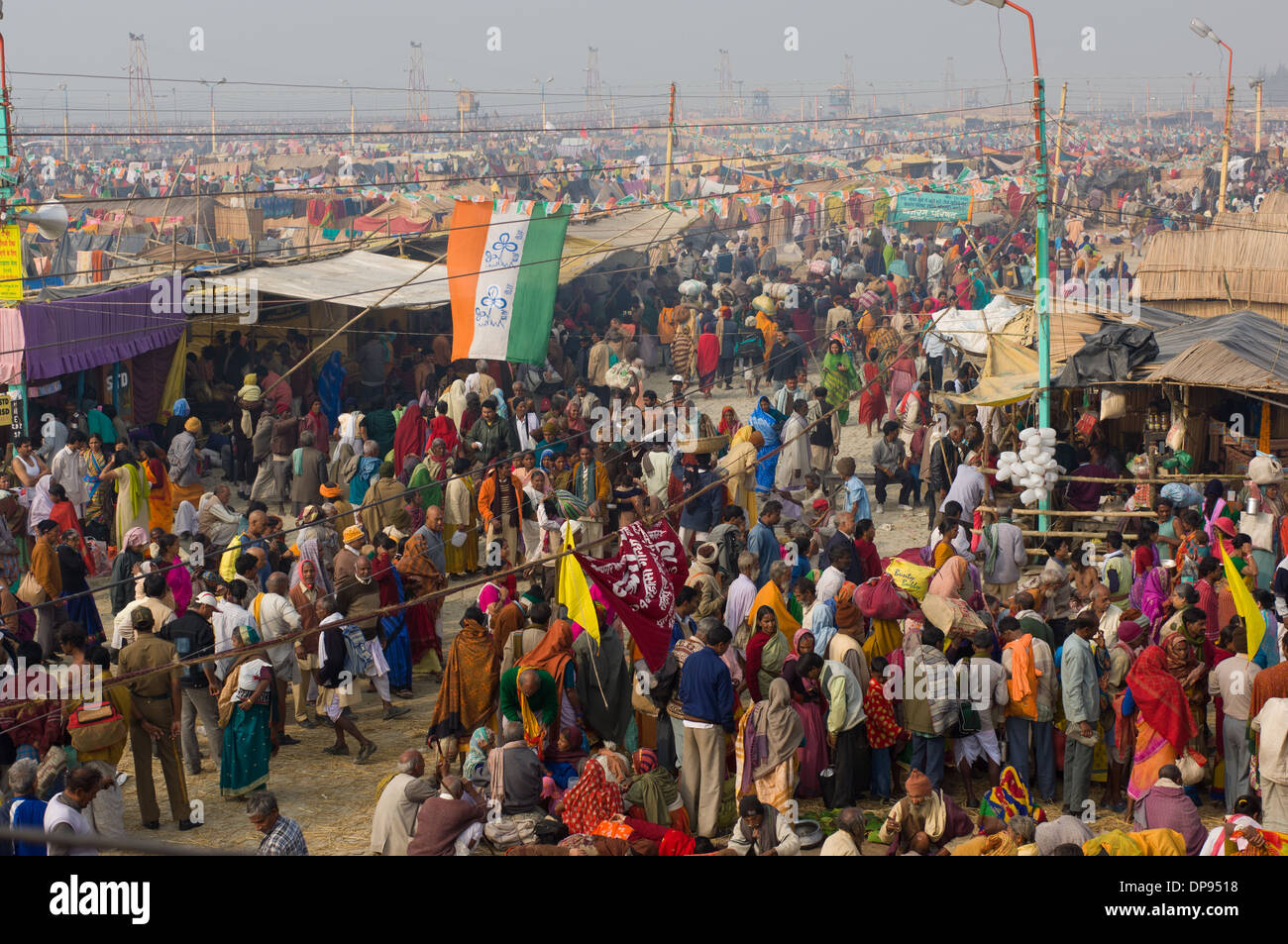 Crowds of pilgrims amidst tented stalls at the mela ground on Makar ...