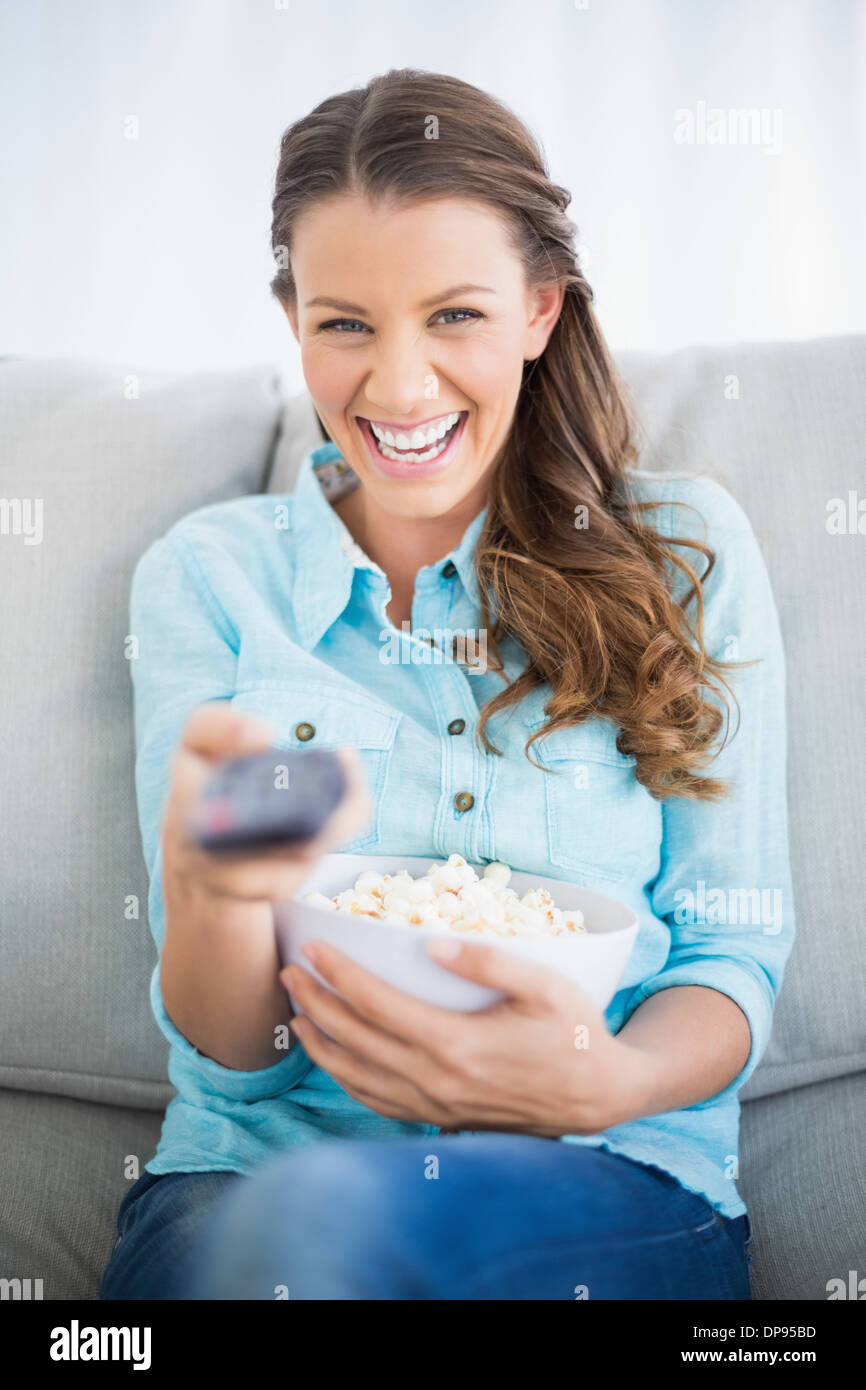 Woman happy watching tv hi-res stock photography and images - Alamy