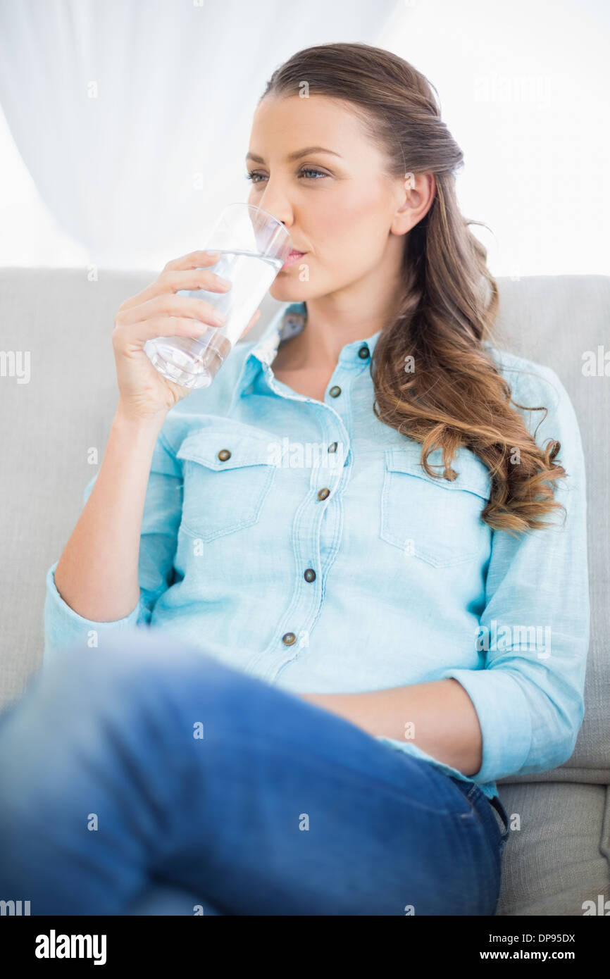 Woman sipping water hi-res stock photography and images - Alamy