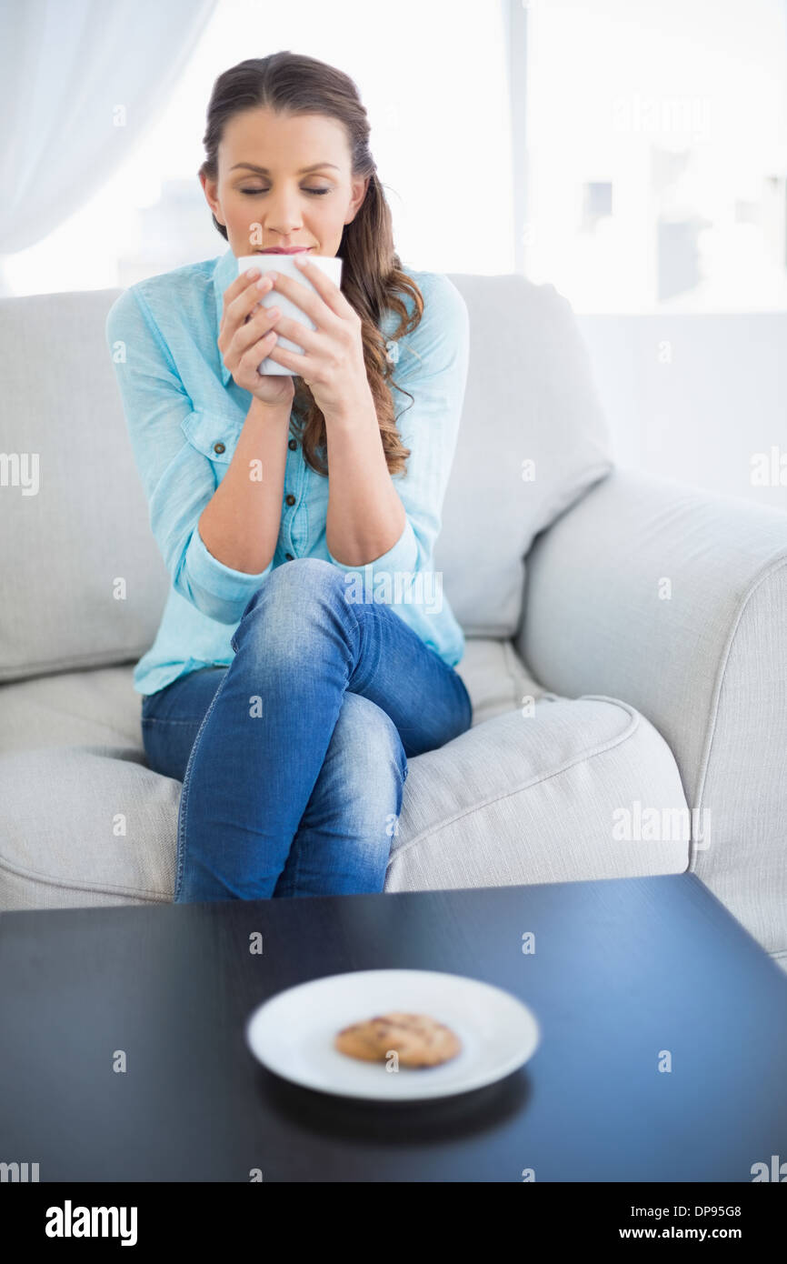 Woman enjoying coffee hi-res stock photography and images - Alamy