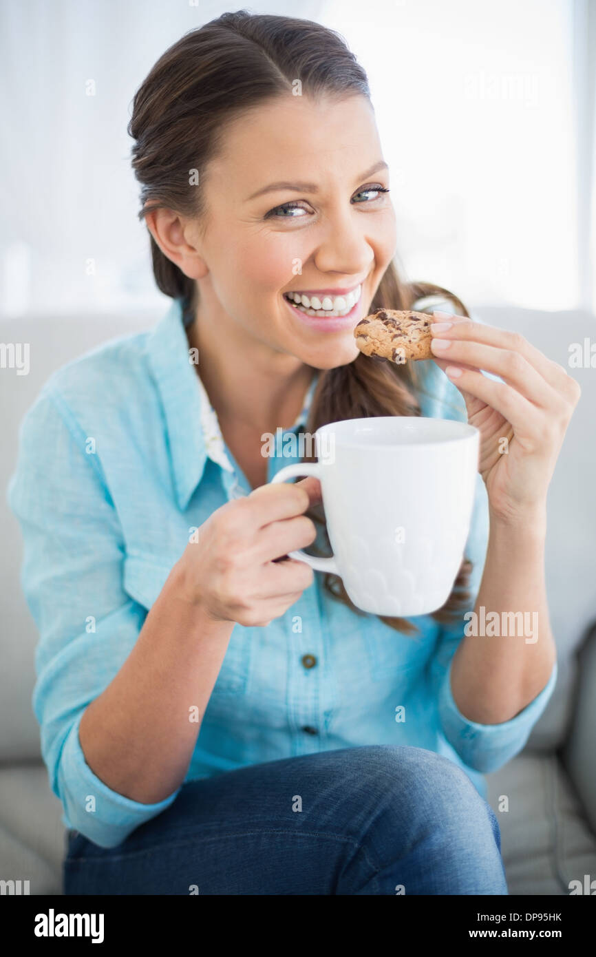 Woman cookie looking at camera hi-res stock photography and images - Alamy