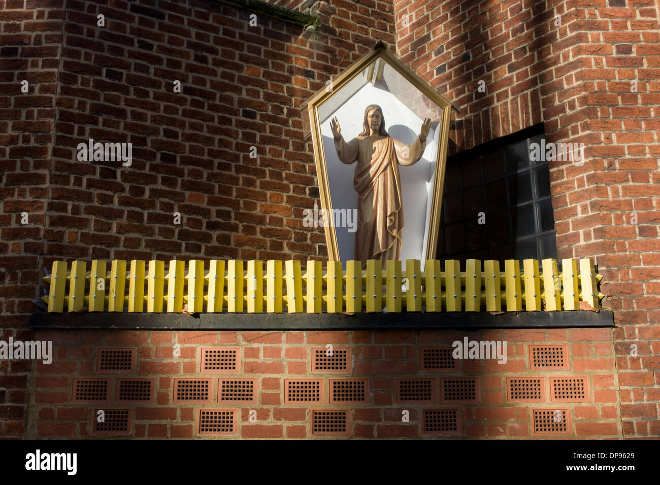 An effigy of Jesus Christ encased in a shrine box outside a Catholic ...