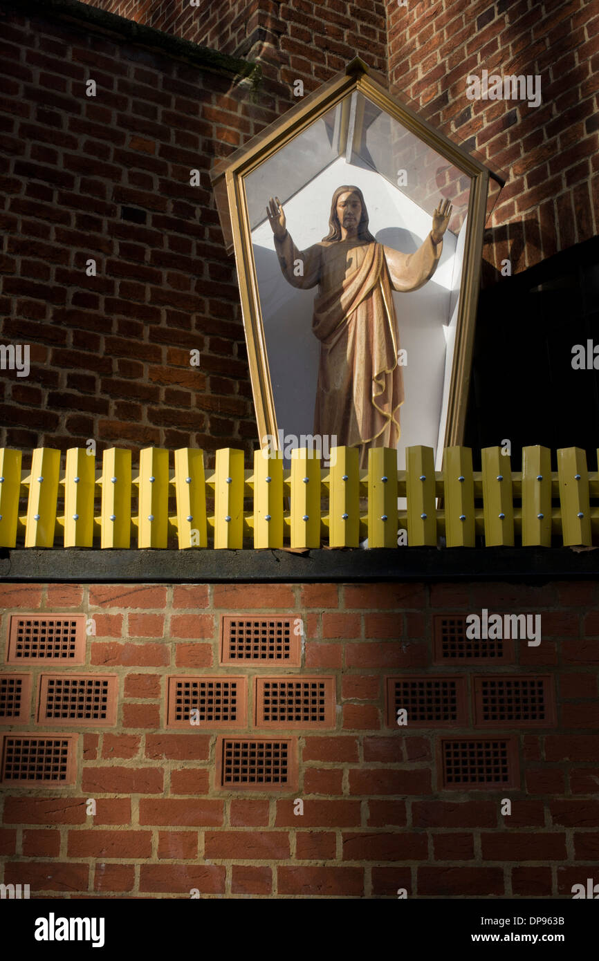 An effigy of Jesus Christ encased in a shrine box outside a Catholic ...
