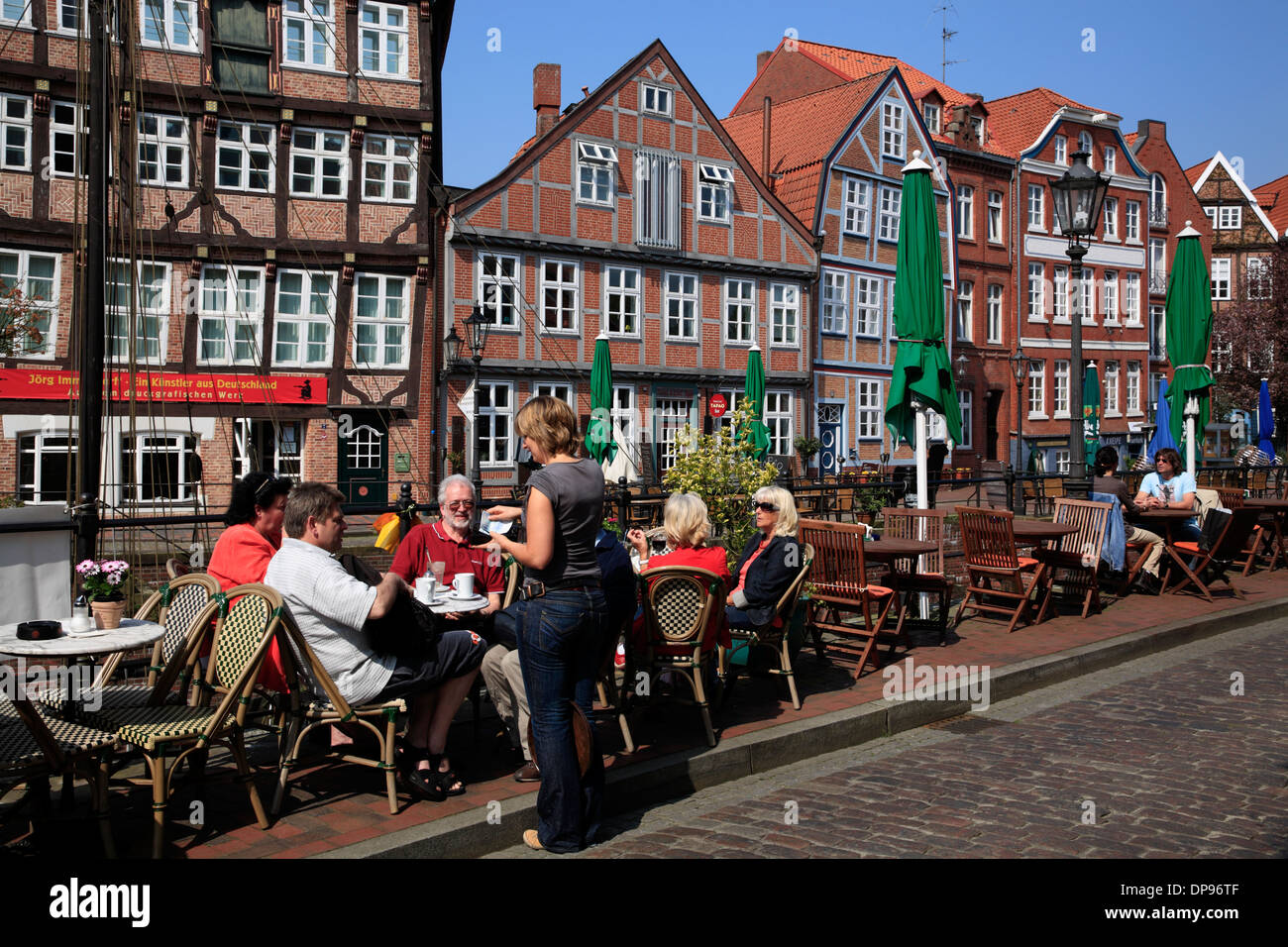 Pavement cafe, Old harbor in Stade, Altes Land area, Lower Saxony ...