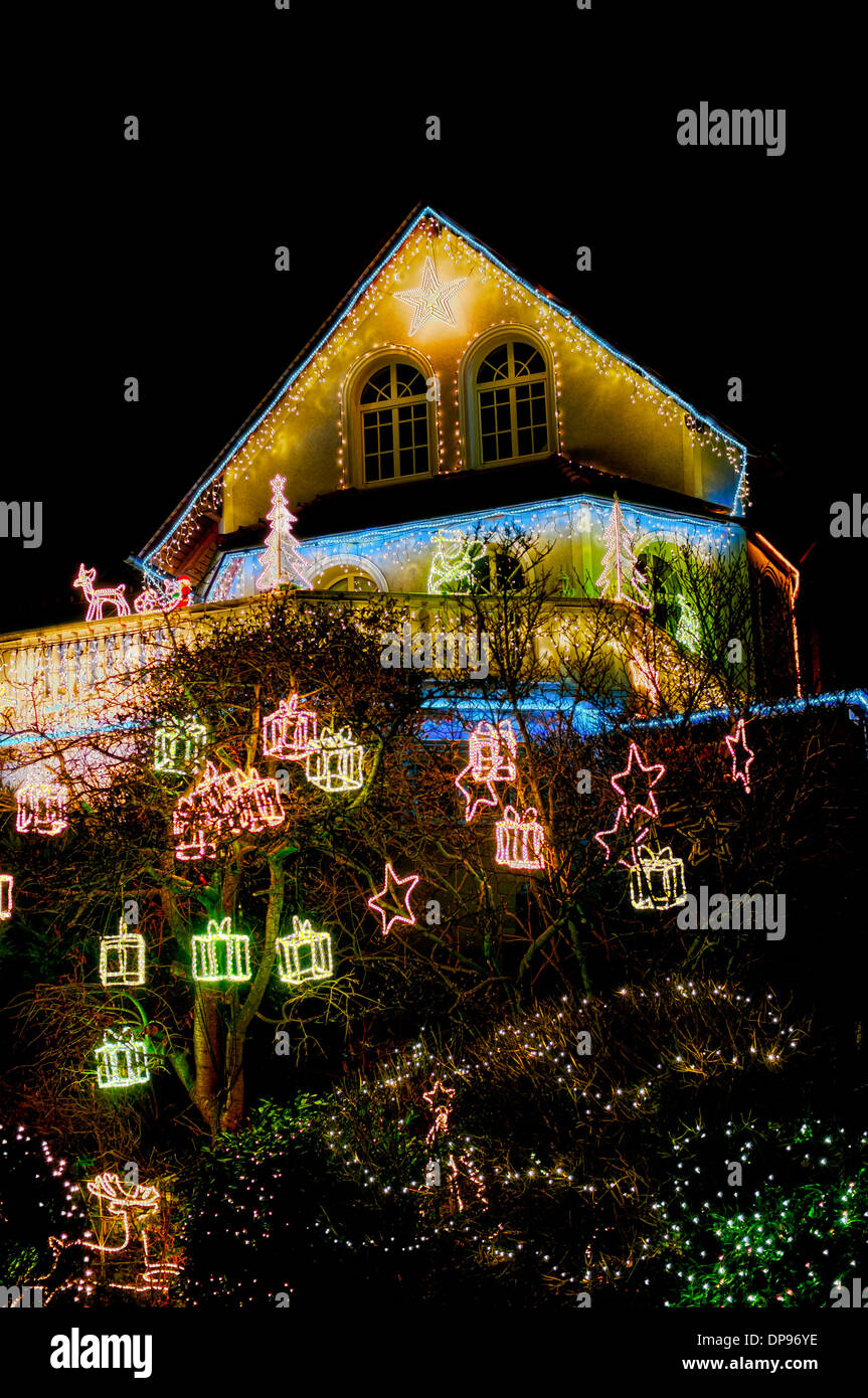 Colorful christmas lights on a family house Stock Photo - Alamy