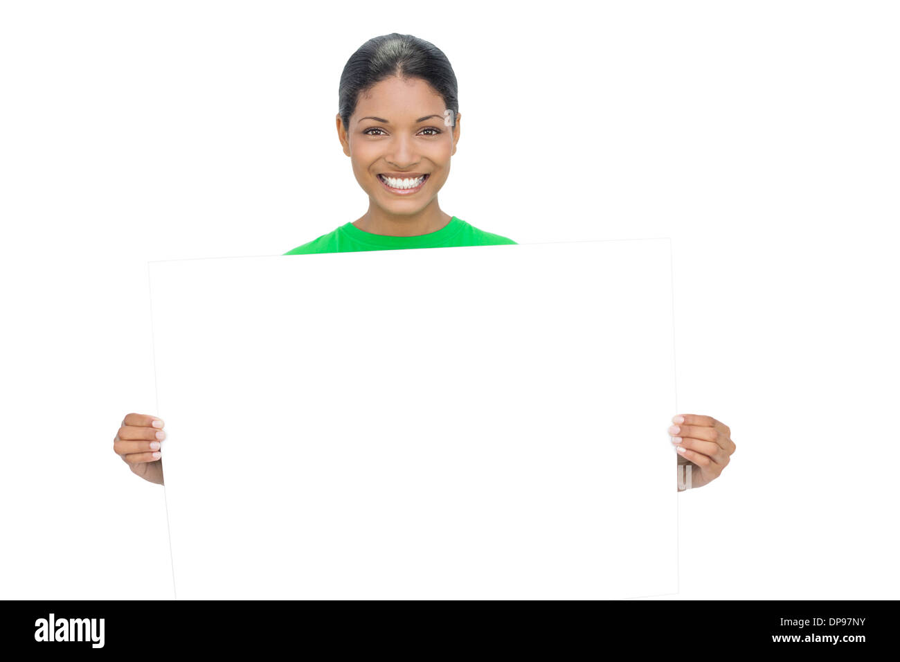 Smiling model holding white sign Stock Photo - Alamy