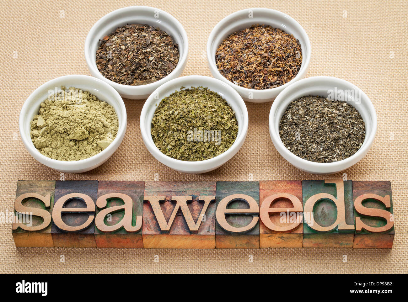 bowls of seaweed diet supplements (bladderwrack, sea lettuce, kelp ...