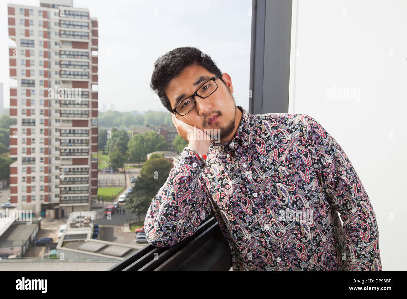 Sad man window hi-res stock photography and images - Alamy