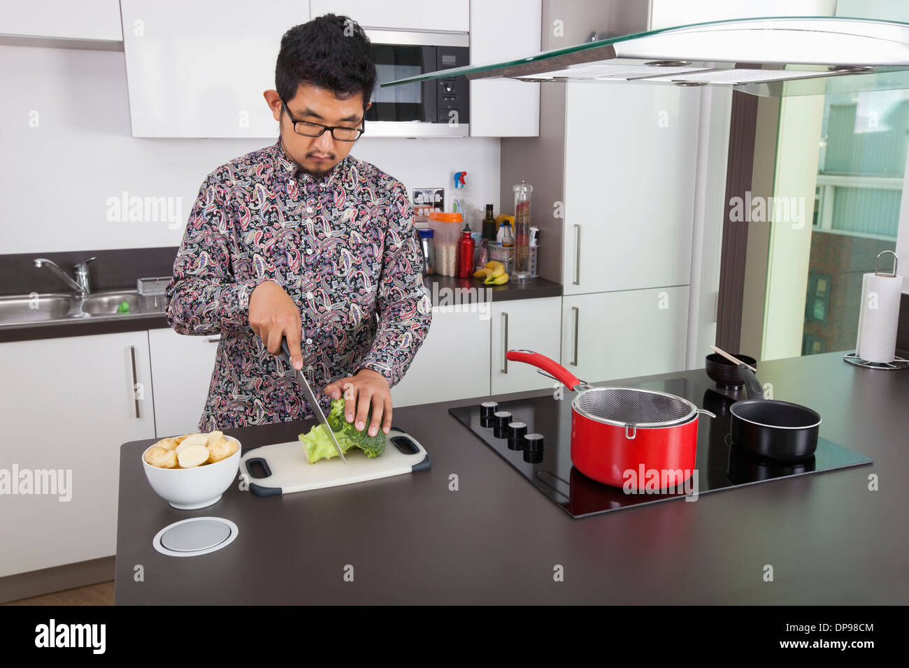 Man eating broccoli hi-res stock photography and images - Alamy