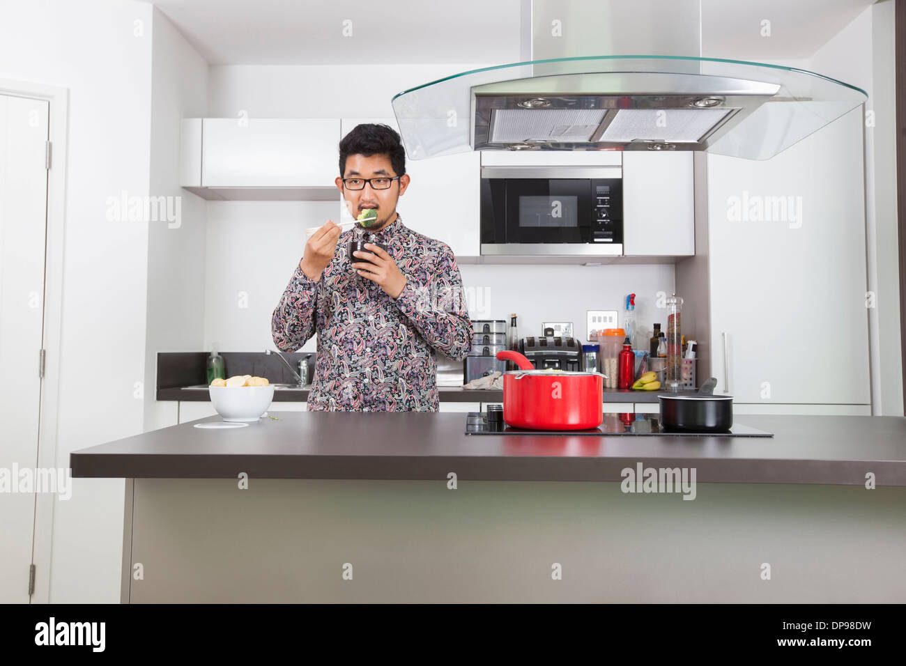 Indian man eating home hi-res stock photography and images - Alamy