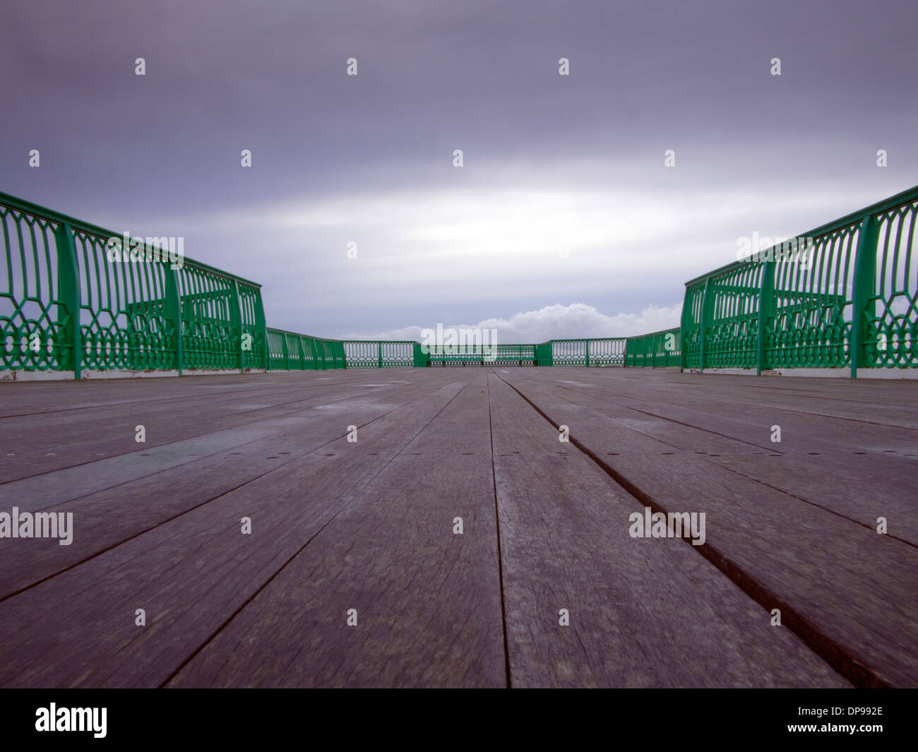 Pier with wrought iron railing Stock Photo - Alamy