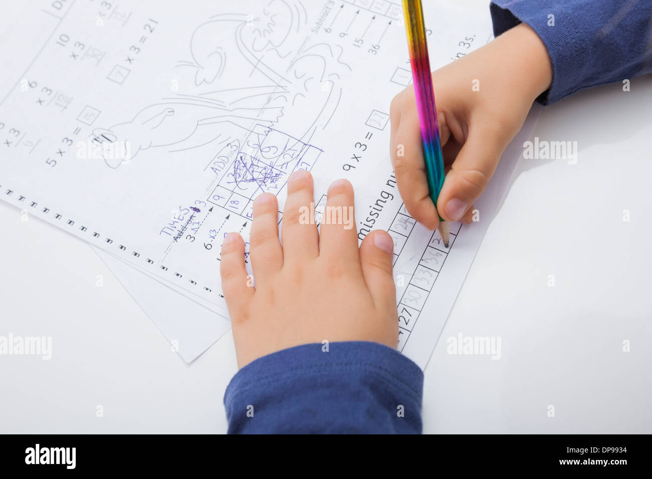 4 hands one pencil hi-res stock photography and images - Alamy