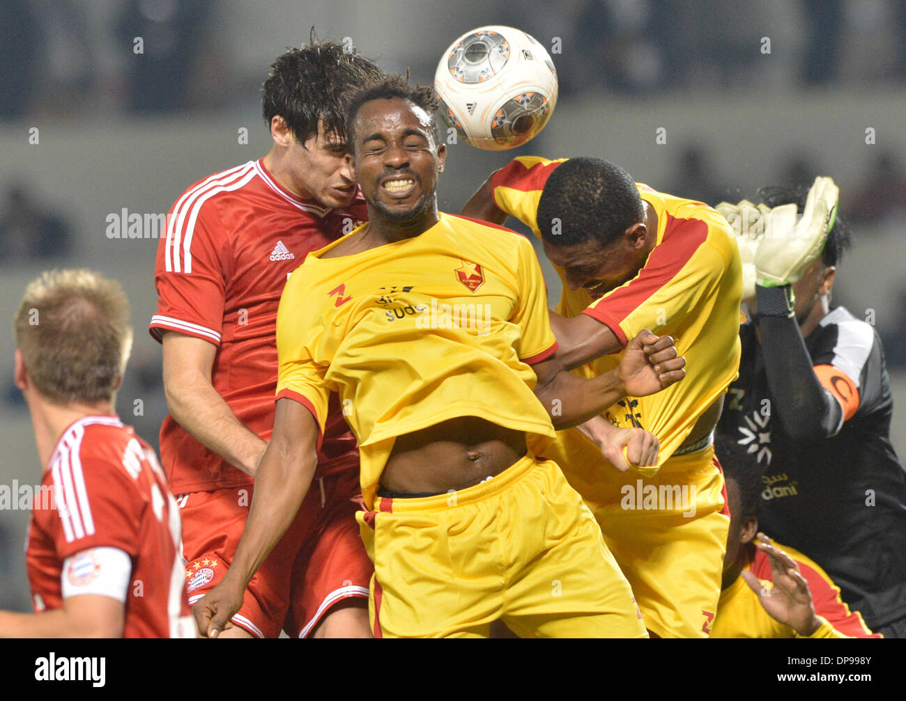 Doha, Qatar. 09th Jan, 2014. Javi Martinez (L-R) of Munich and Ghandi ...