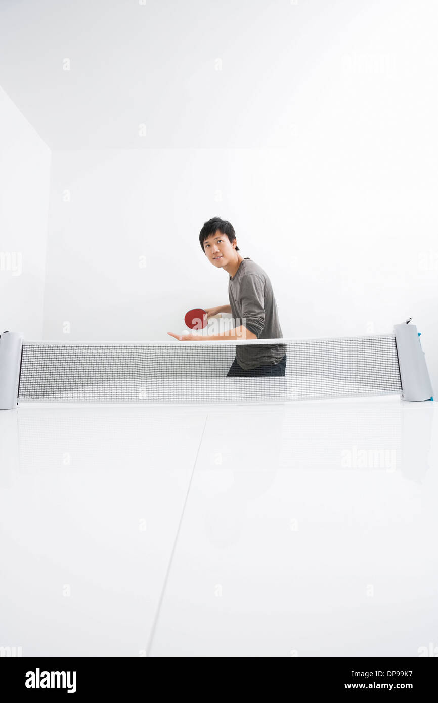 Man playing table tennis hi-res stock photography and images - Alamy