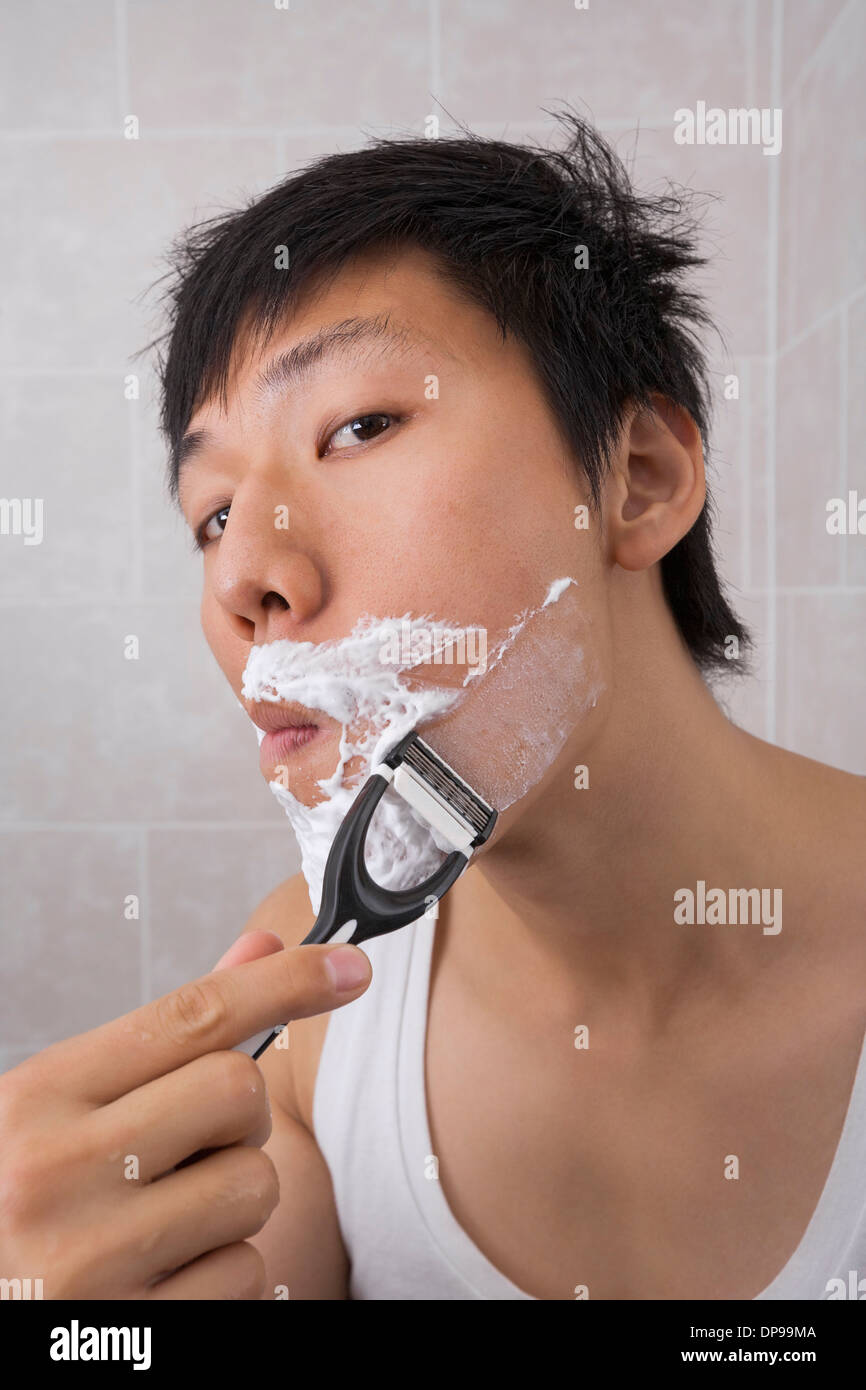 Man shaving hi-res stock photography and images - Alamy
