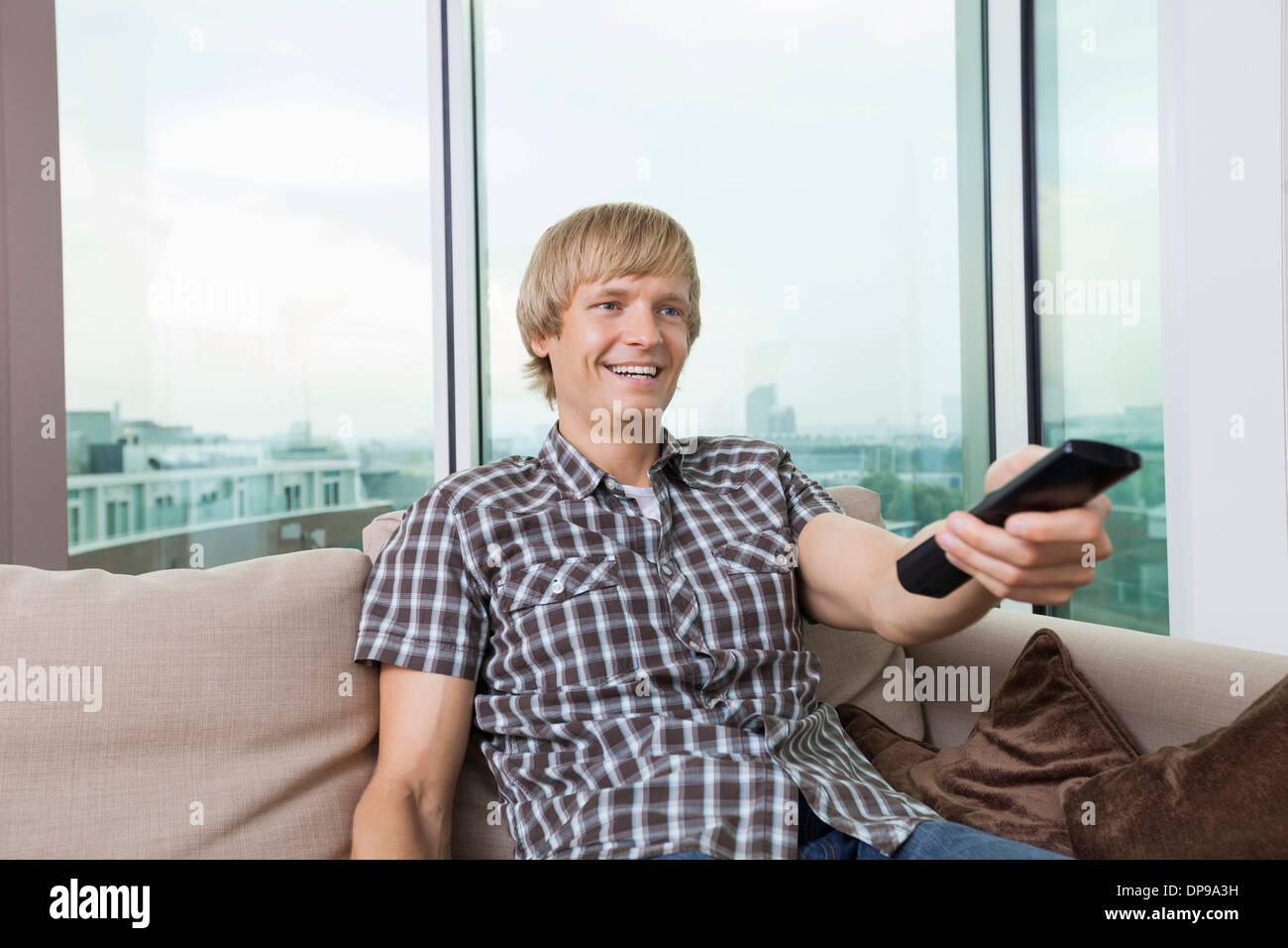 Person watching tv adult hi-res stock photography and images - Alamy