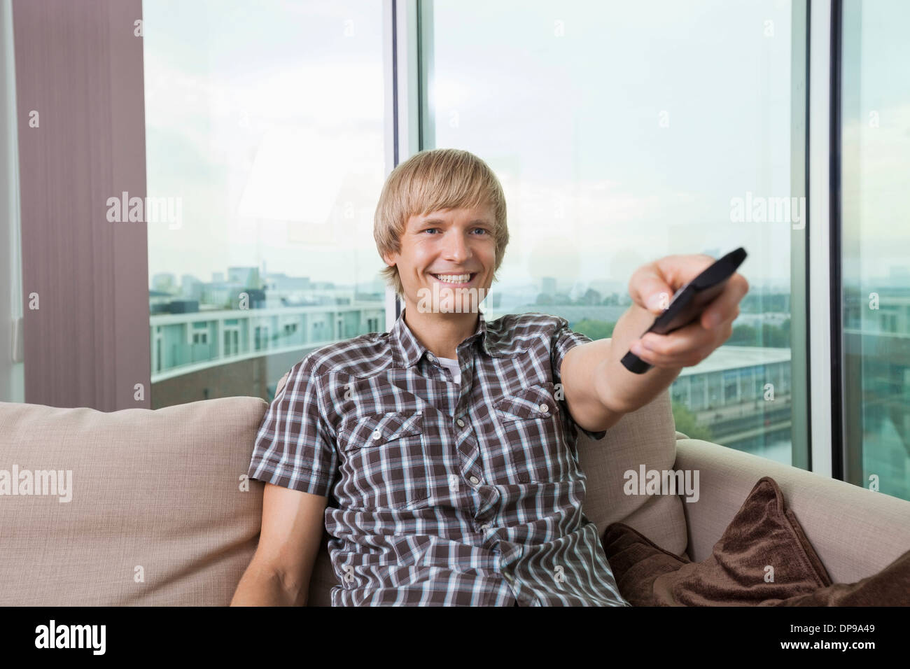 Person watching tv adult hi-res stock photography and images - Alamy