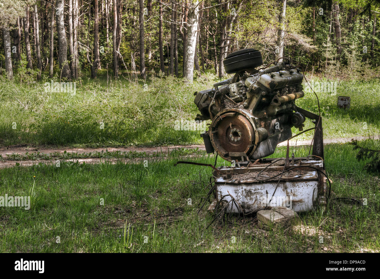 Old machine engine left into forest Stock Photo - Alamy