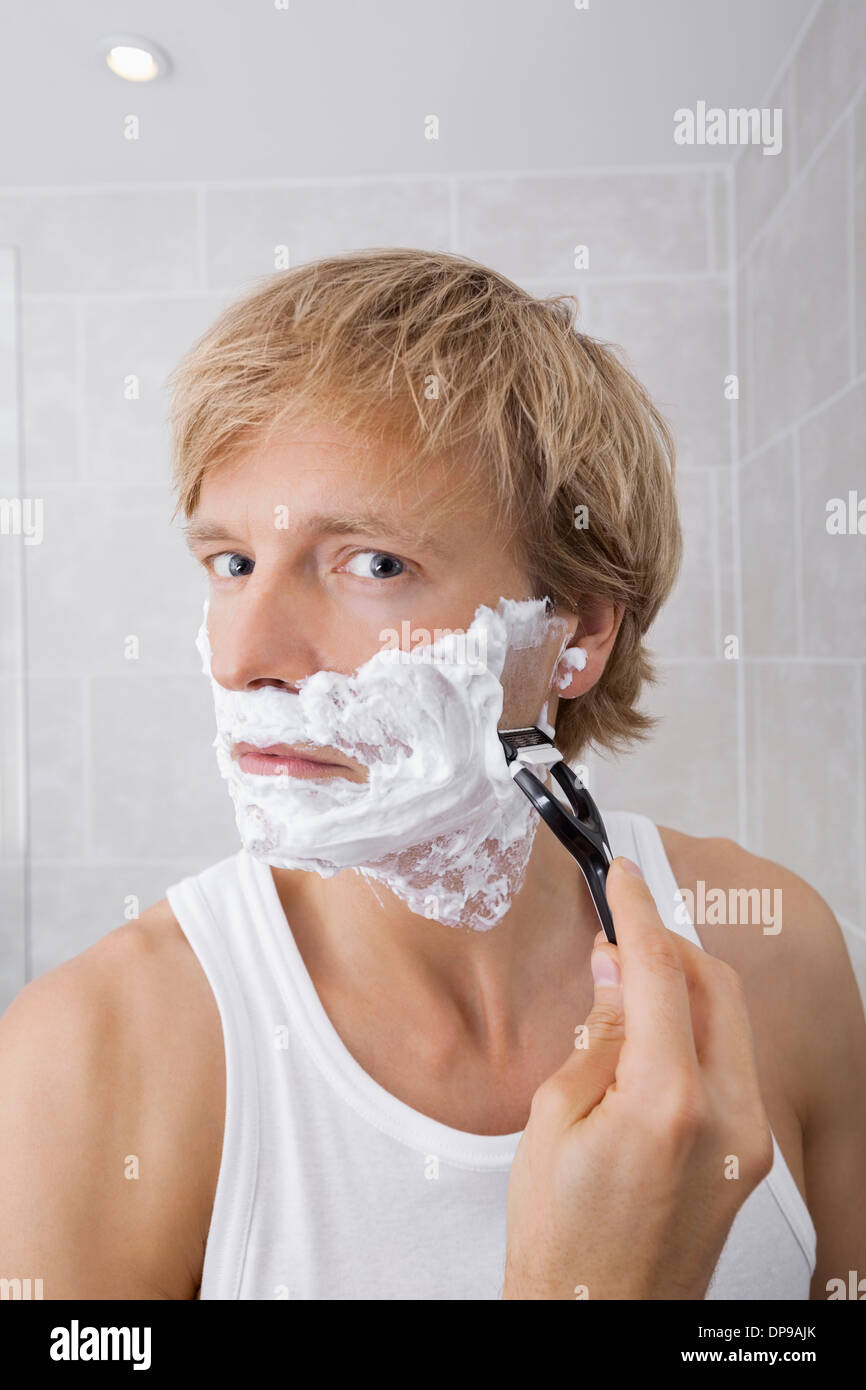 Shaving in bathroom hi-res stock photography and images - Alamy
