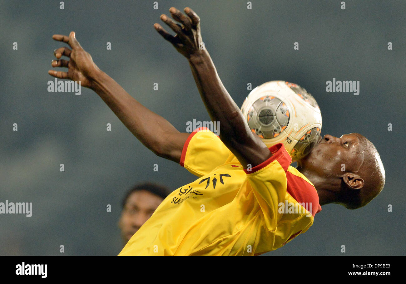 Doha, Qatar. 09th Jan, 2014. Thahir al Hajj of Al-Merrikh with the ball ...