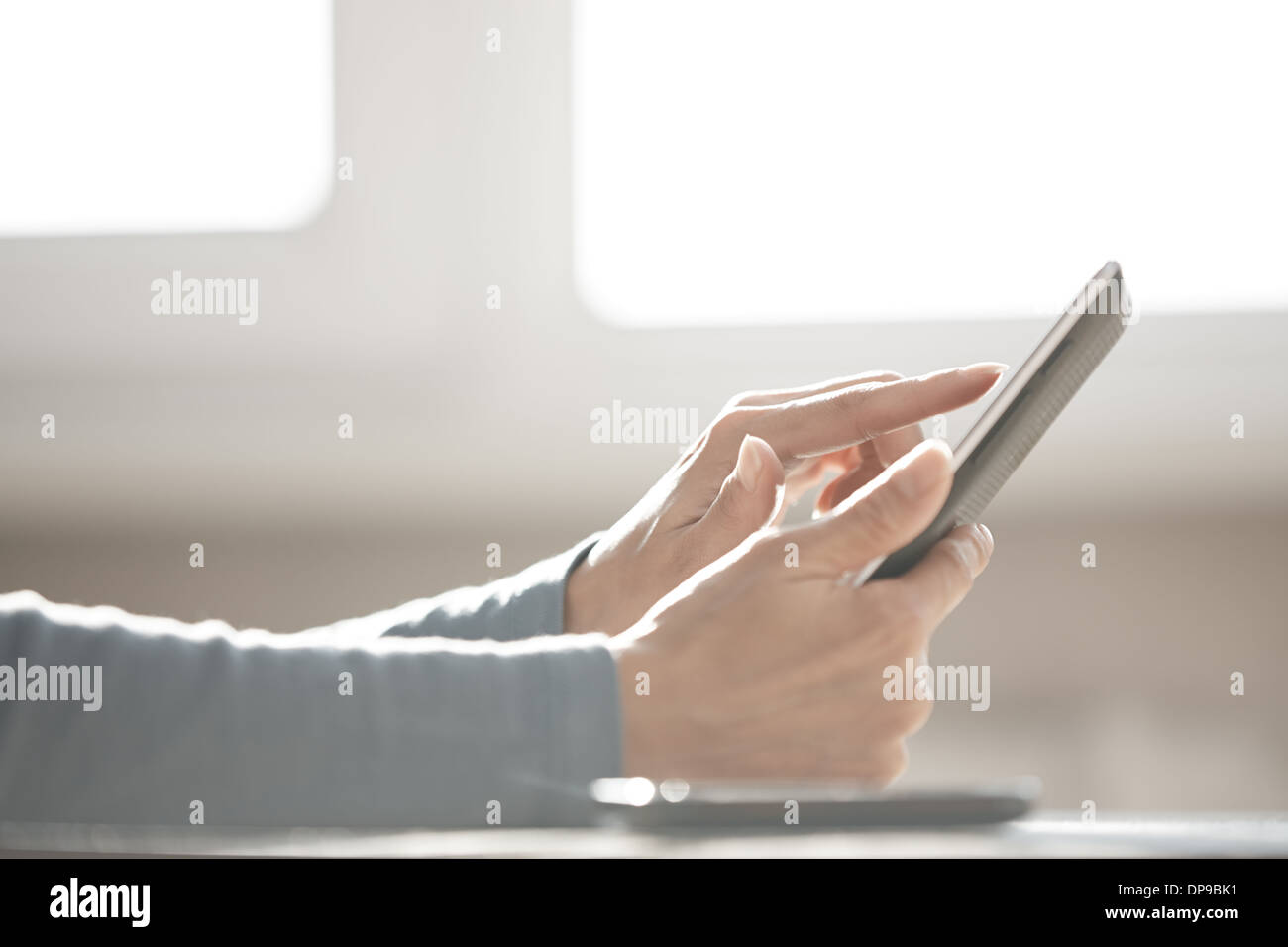 Human hands using tablet hi-res stock photography and images - Alamy