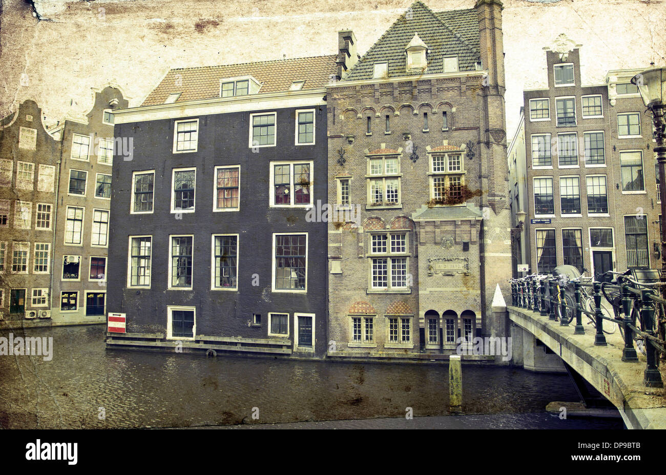 Vintage photo of traditional dutch buildings and canal, in city of ...