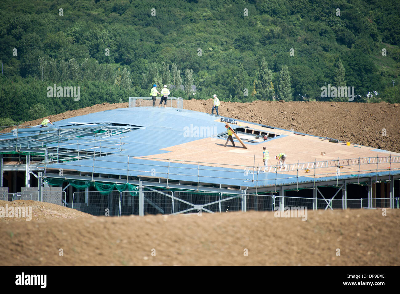 Roof being built on new Motorway Services Building Stock Photo - Alamy