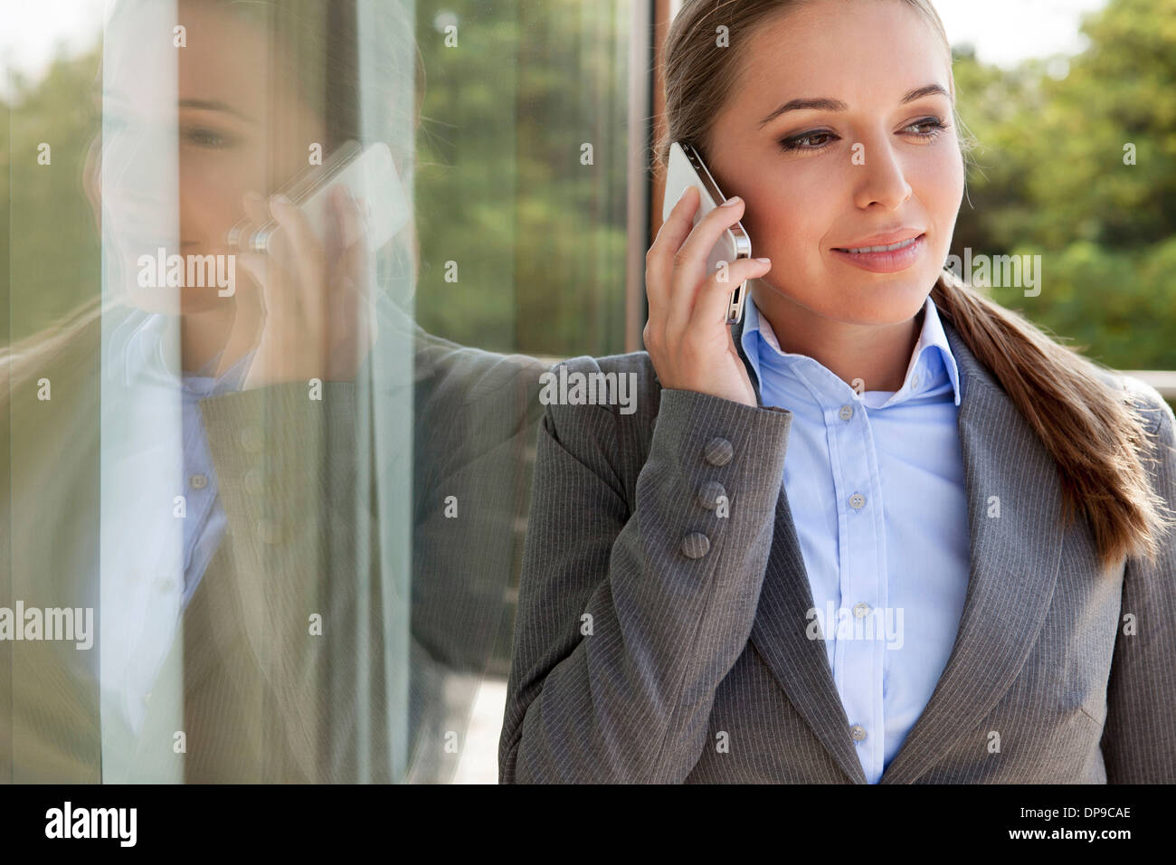 Woman and answering door hi-res stock photography and images - Alamy