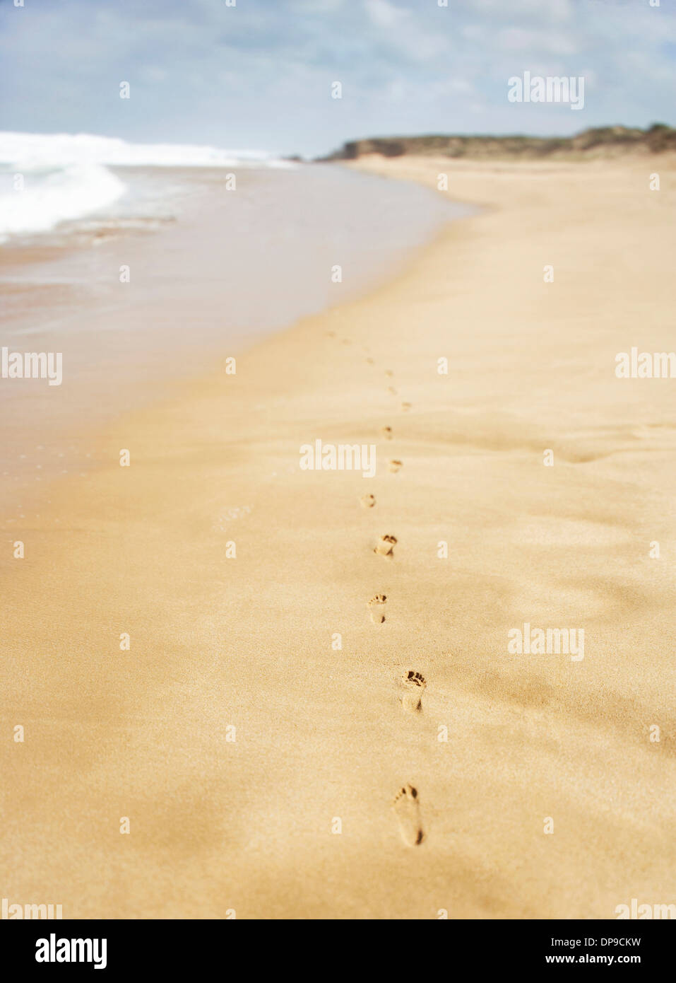 Footprints on sand at beach Stock Photo - Alamy