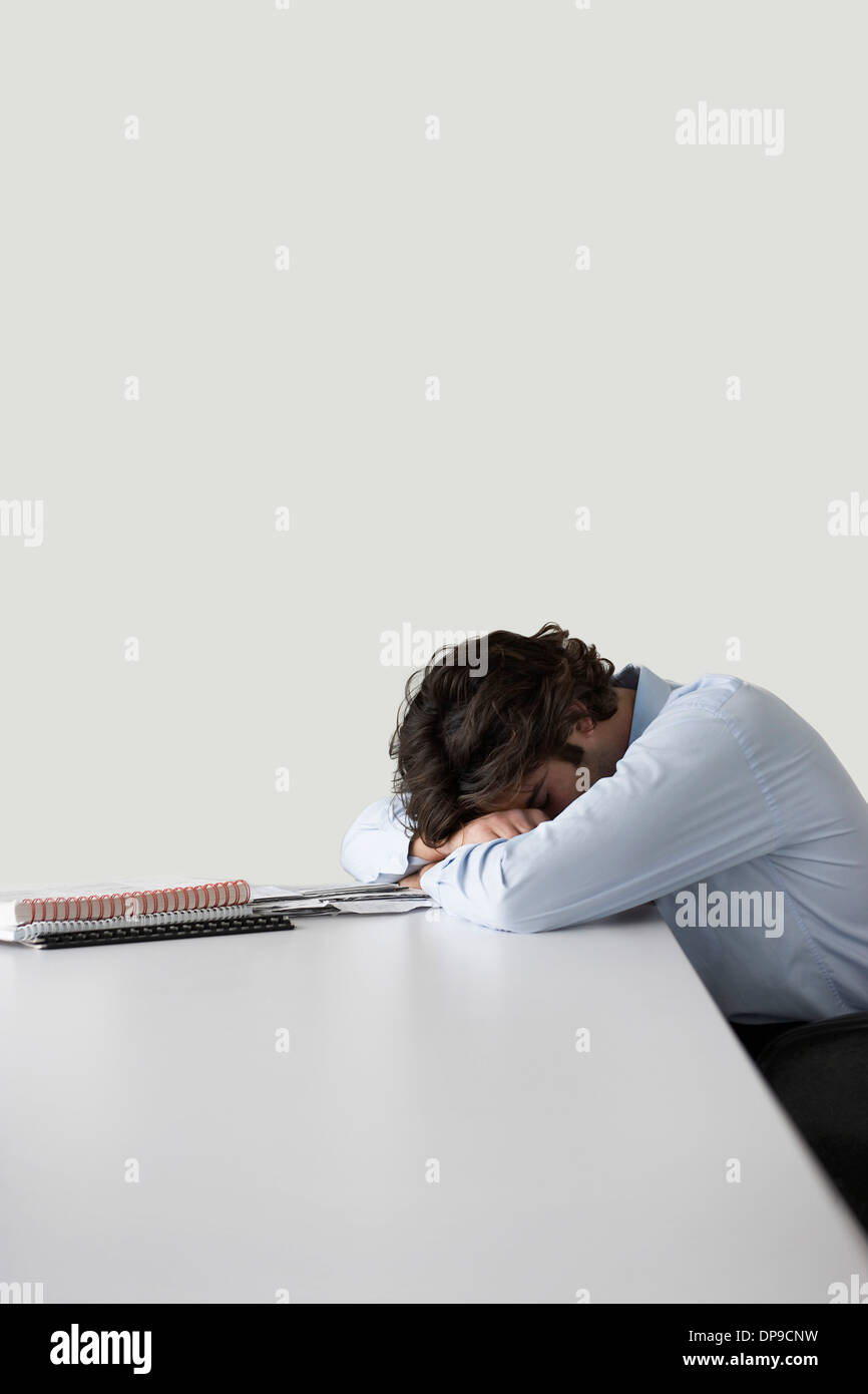 Young man resting head hi-res stock photography and images - Alamy