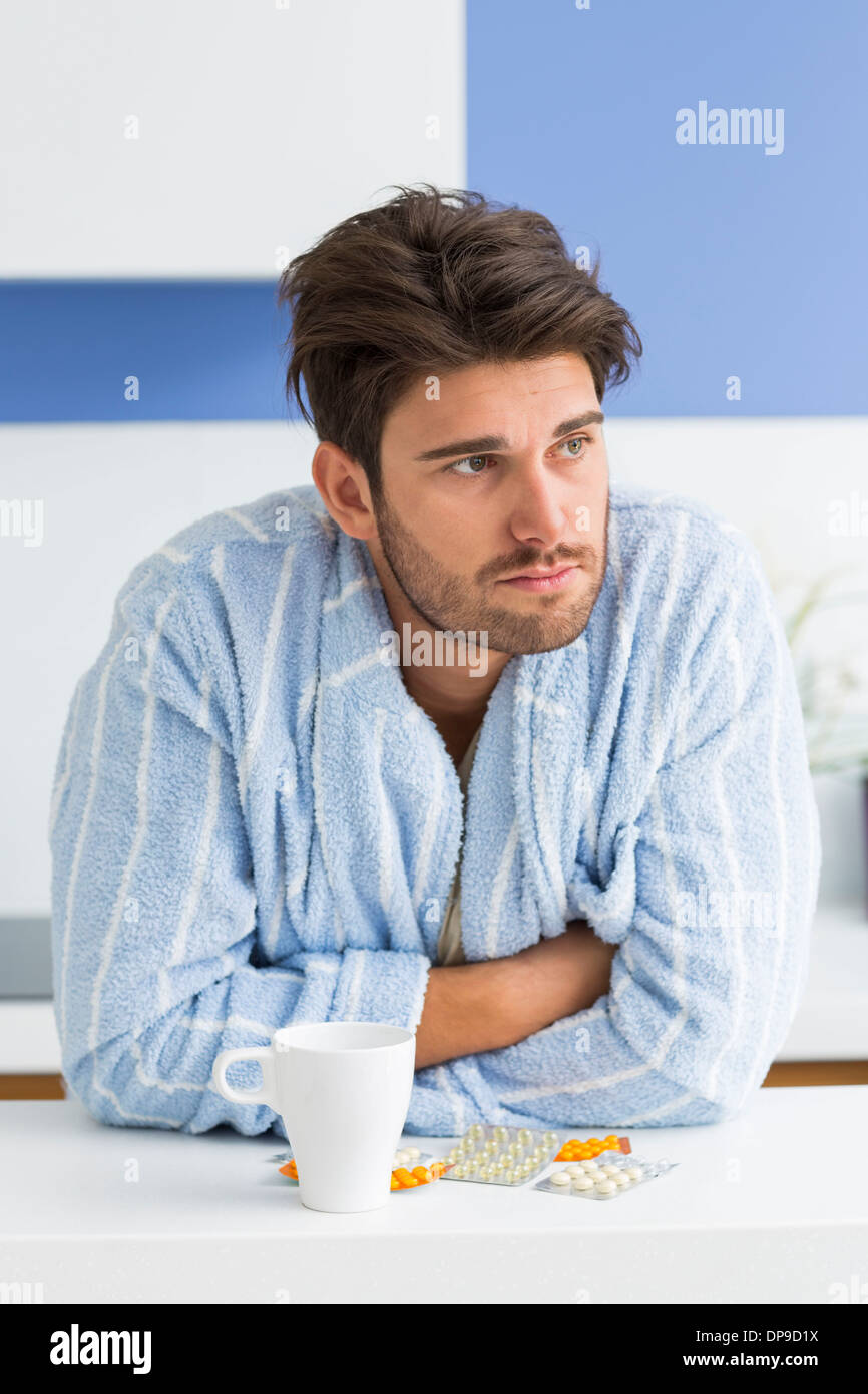 Leaning on counter hi-res stock photography and images - Alamy