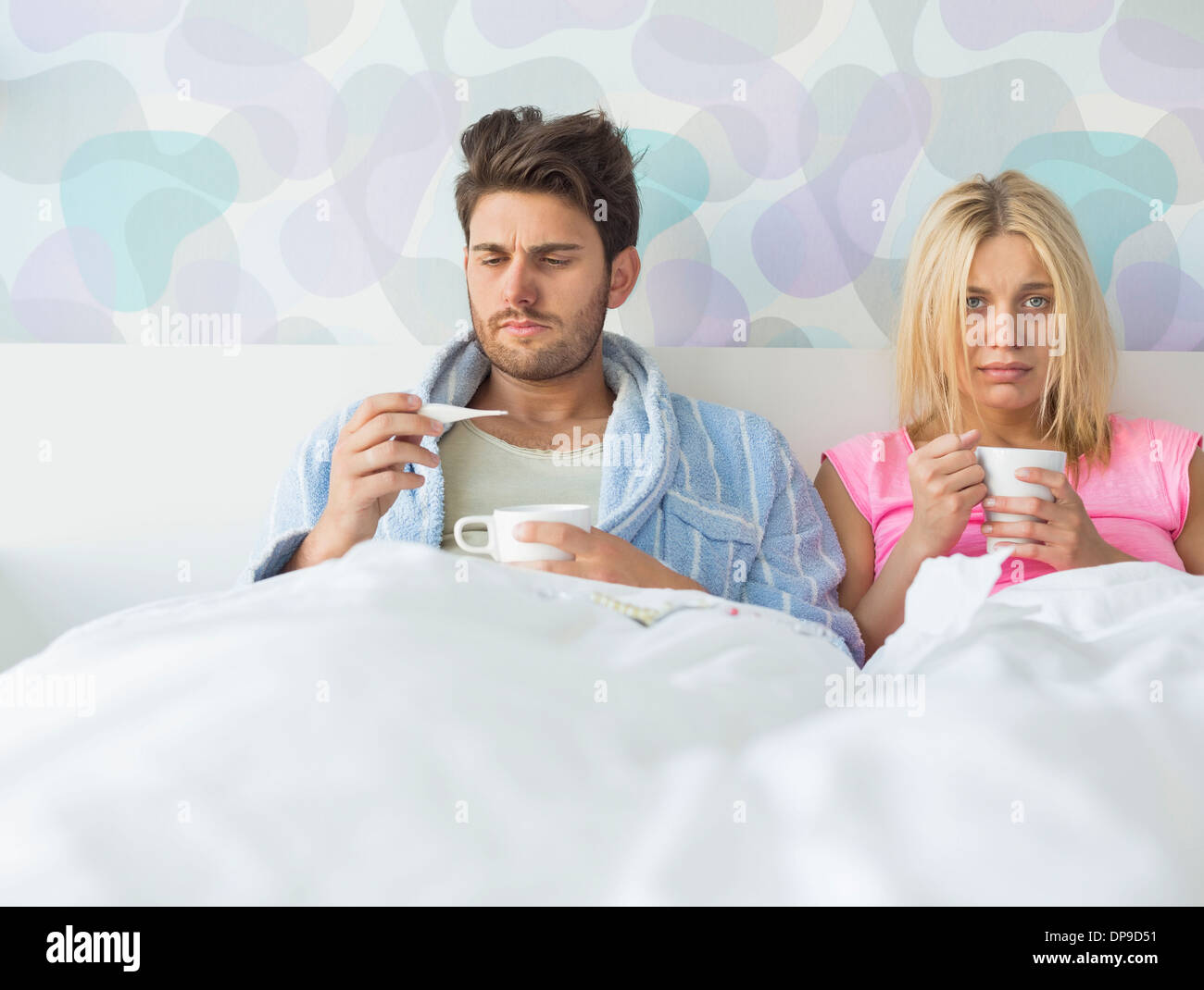 Couple sad bed hi-res stock photography and images - Alamy
