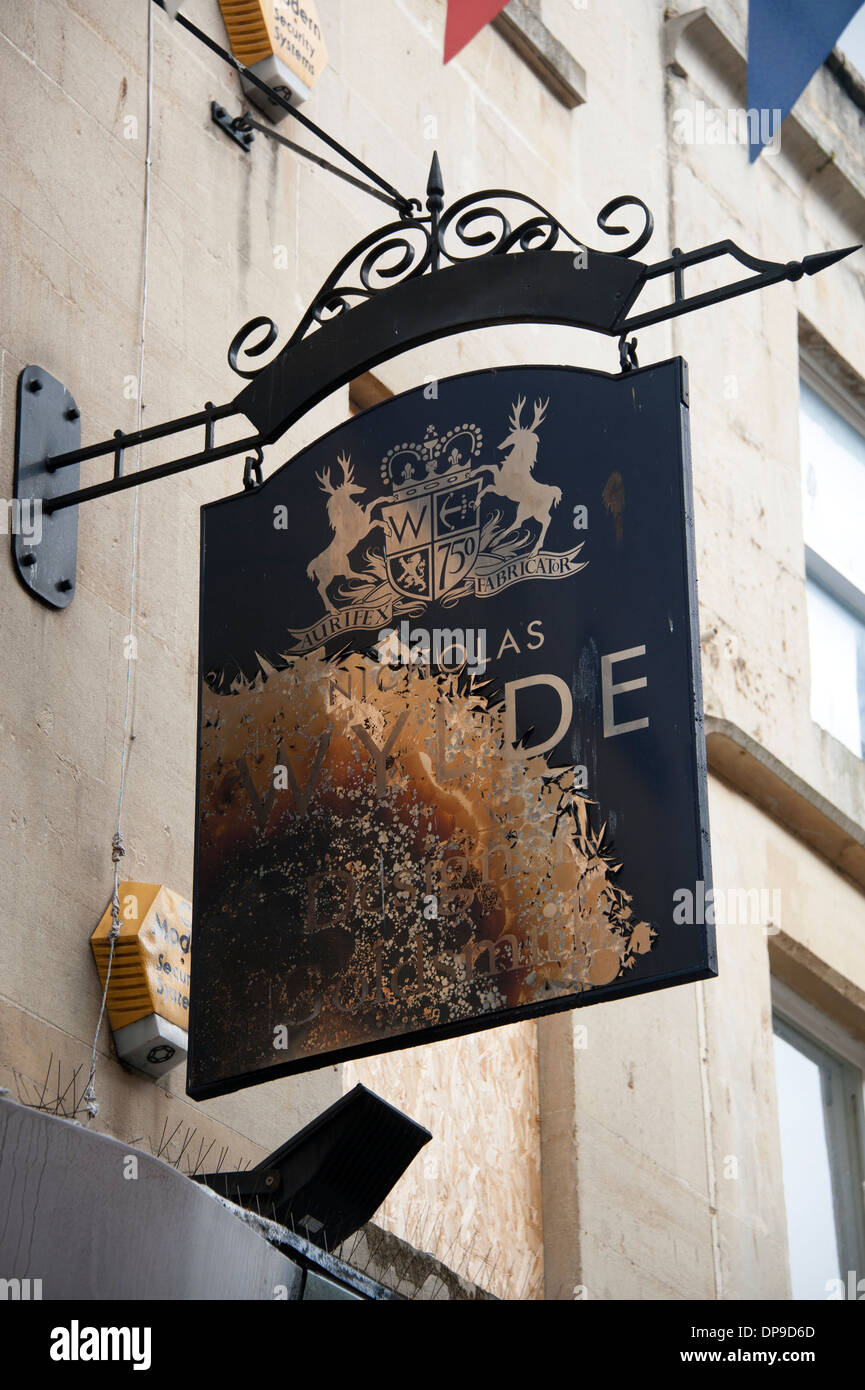 Burnt Shop Sign following Fire Scorched charred retail Stock Photo - Alamy