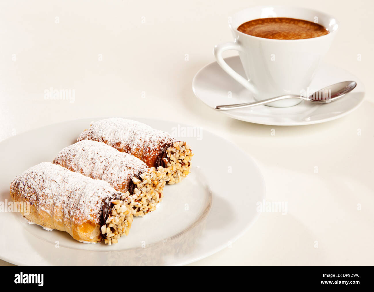 Italian pastries with a coffee cup Stock Photo - Alamy