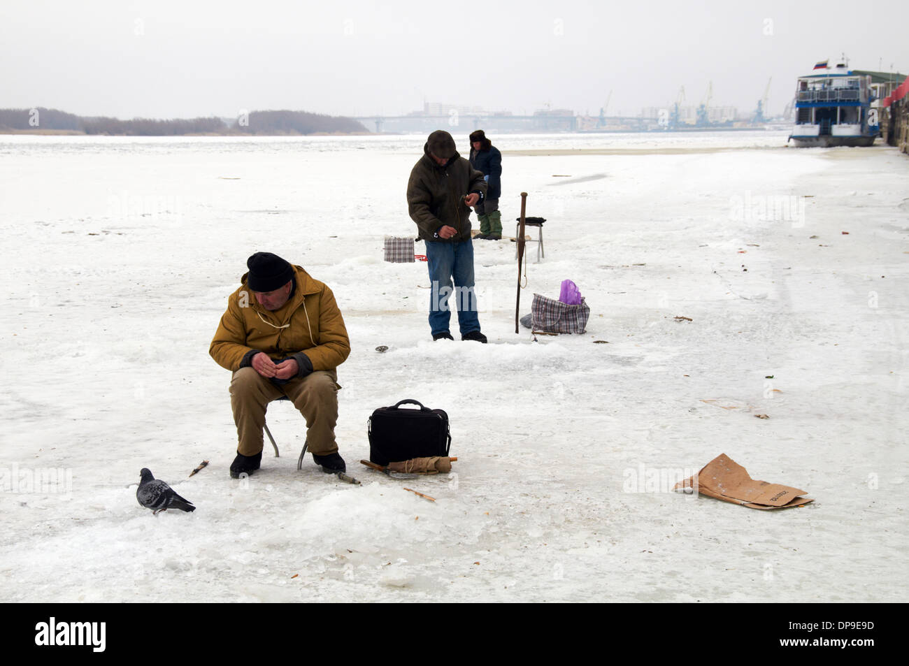 Ice fishing at Volga River in Astrakhan, Russia Stock Photo - Alamy