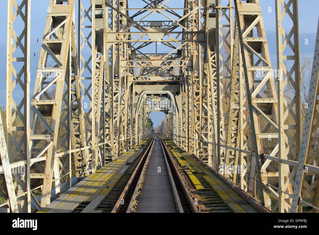 Abandoned railroad bridge over the river Stock Photo - Alamy