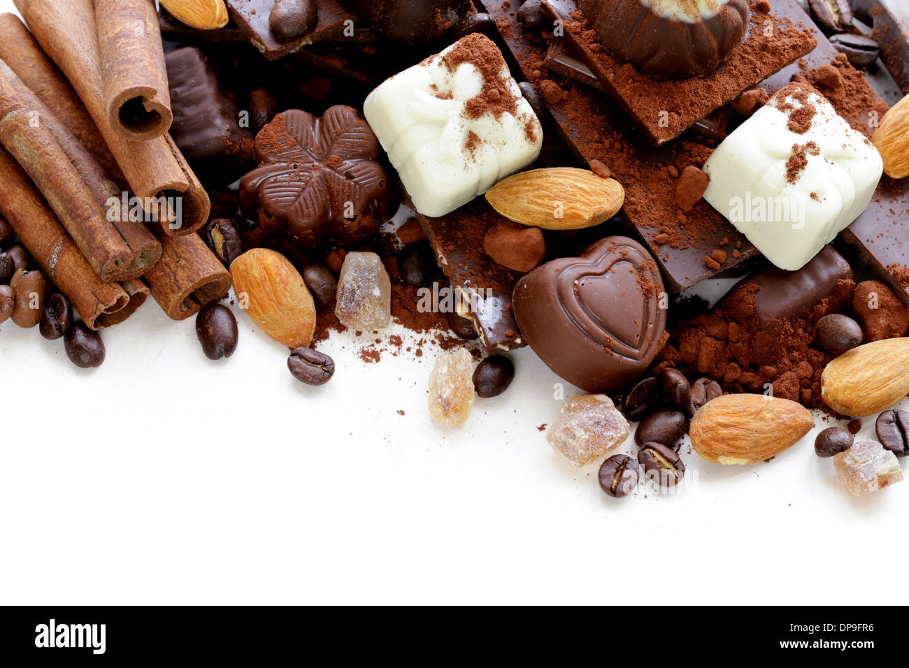 different varieties of chocolate and sweets on a white background Stock ...