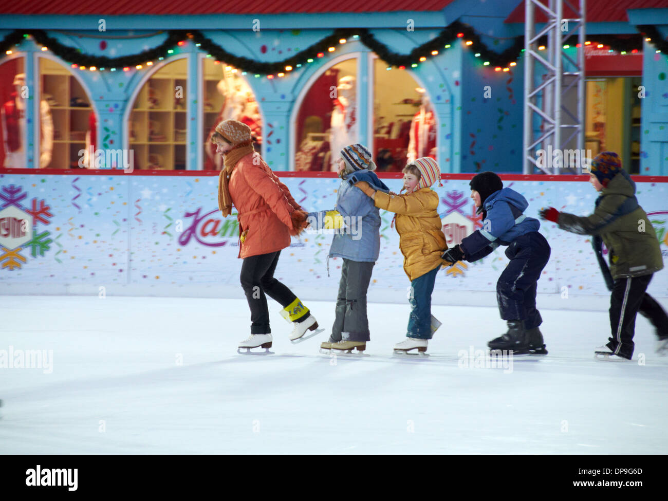 Russian children skating on the Red Square ice rink Stock Photo - Alamy