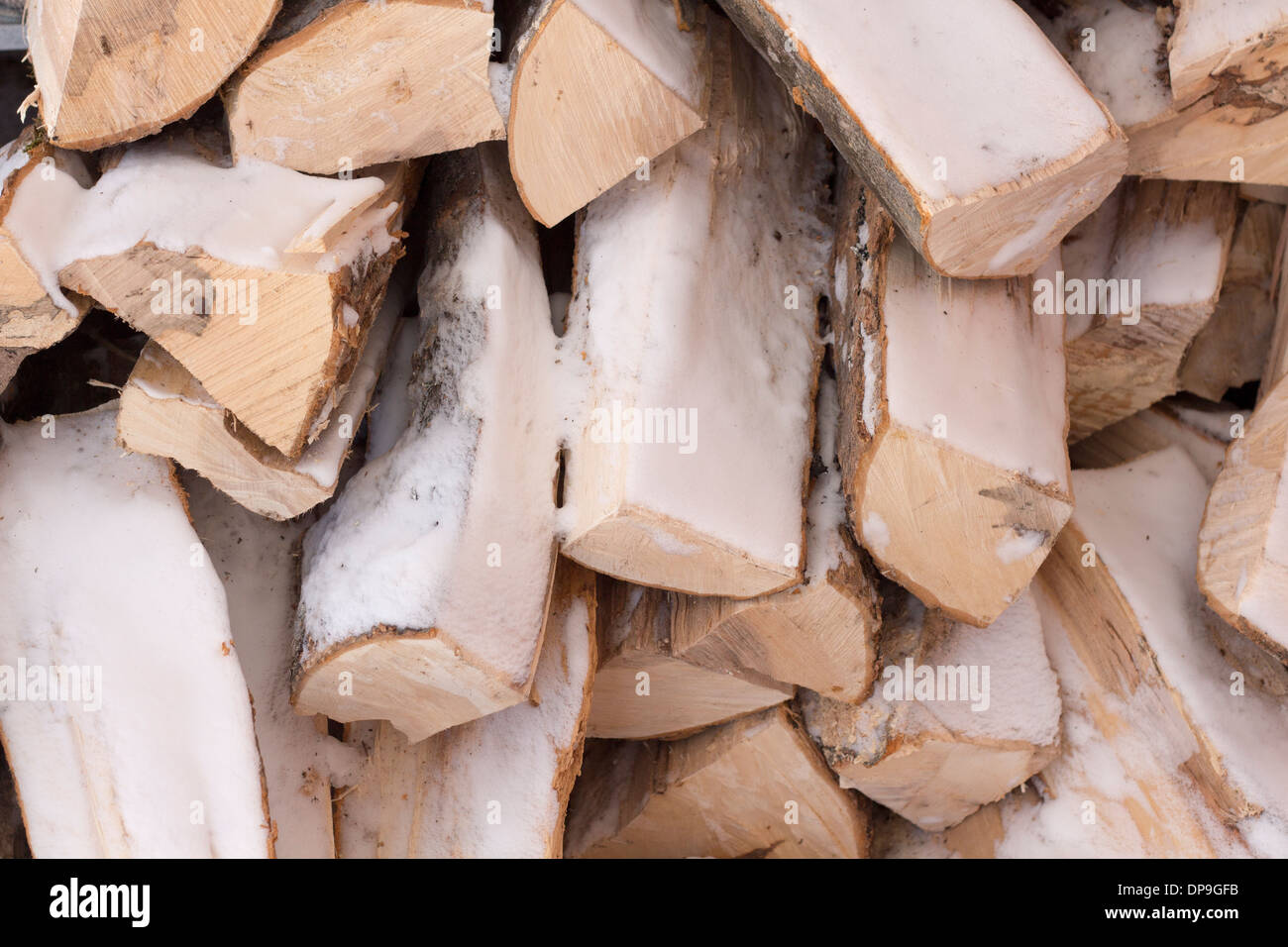 Snow covered firewood stack hi-res stock photography and images - Alamy