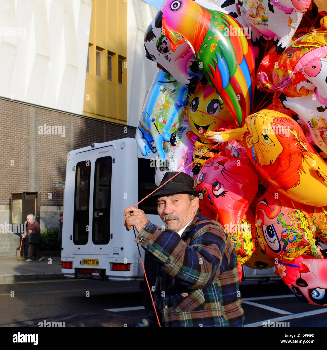 Man selling balloons hi-res stock photography and images - Alamy