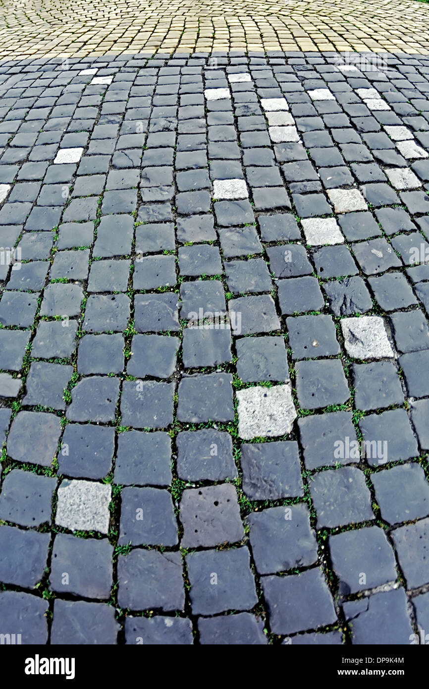 Detail of cobblestone sidewalk made of cubic stones Stock Photo - Alamy