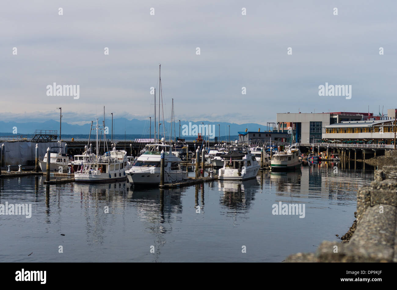 Boats docked along the pier near waterfront park Port of Seattle ...