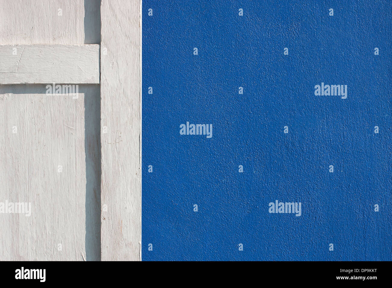Blue walls and white window with custom text space Stock Photo - Alamy